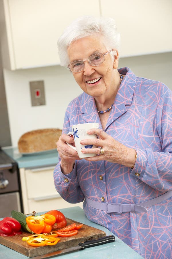 Elderly Woman Drinking Tea in the Kitchen Stock Image - Image of female ...