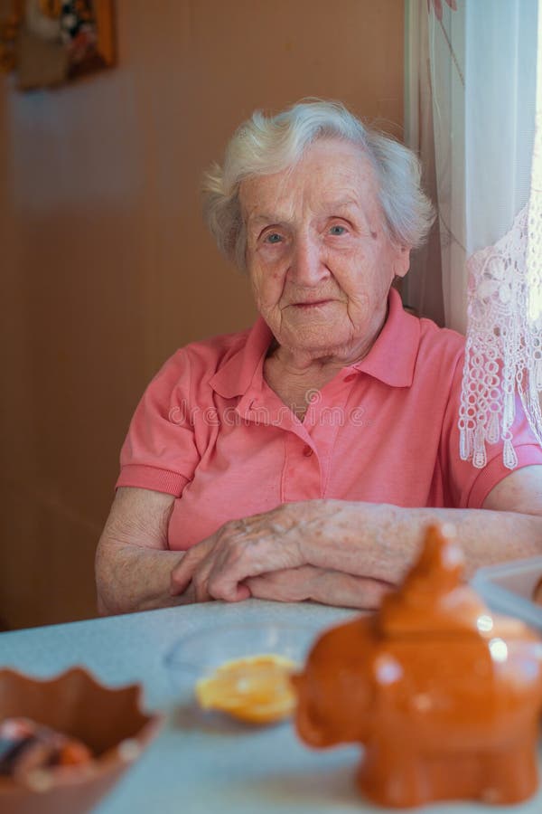 An Elderly Woman in Her Home. Stock Photo - Image of real, portrait ...