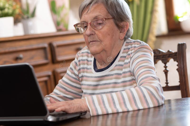 Elderly Woman and New Technologies Stock Image - Image of mature ...