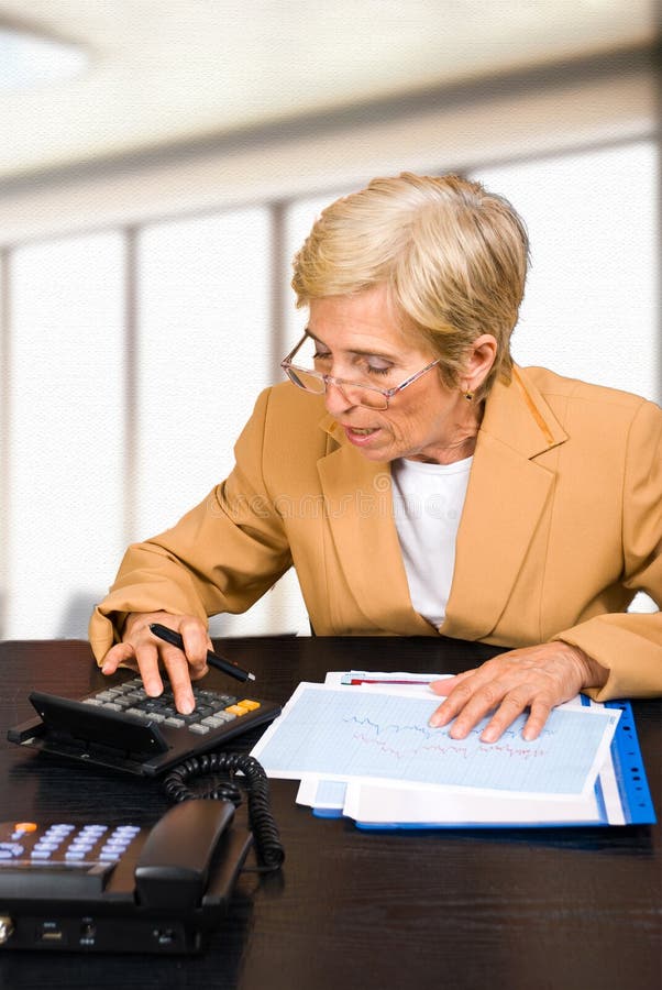 Elderly Woman in Office Environment Stock Photo - Image of adaptability ...