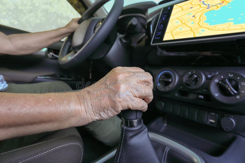 Elderly Woman Using GPS Navigation in Car Stock Image - Image of ...