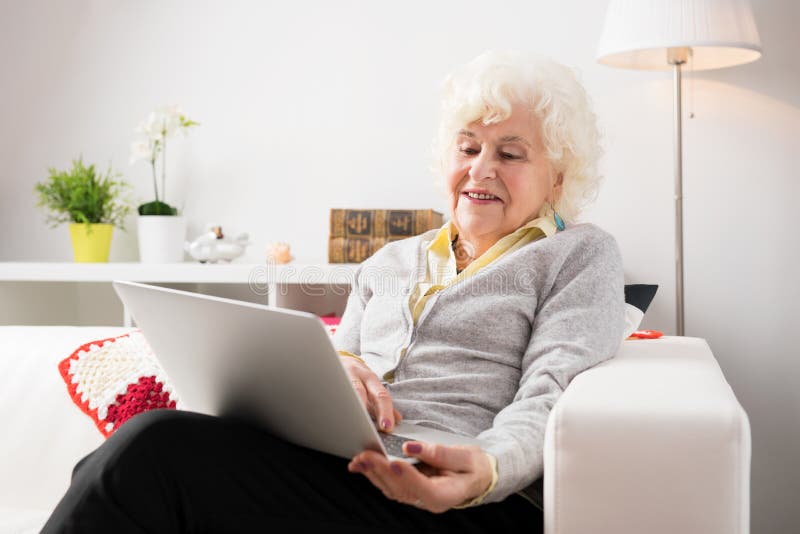 Elderly Woman Using Laptop Computer Stock Photo - Image of cool, laptop ...