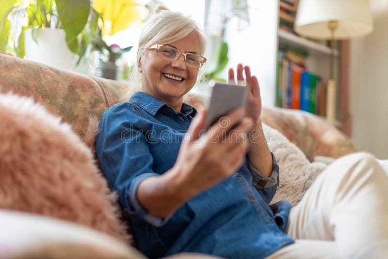 Elderly Woman Using Smartphone Stock Image - Image of granny, care ...