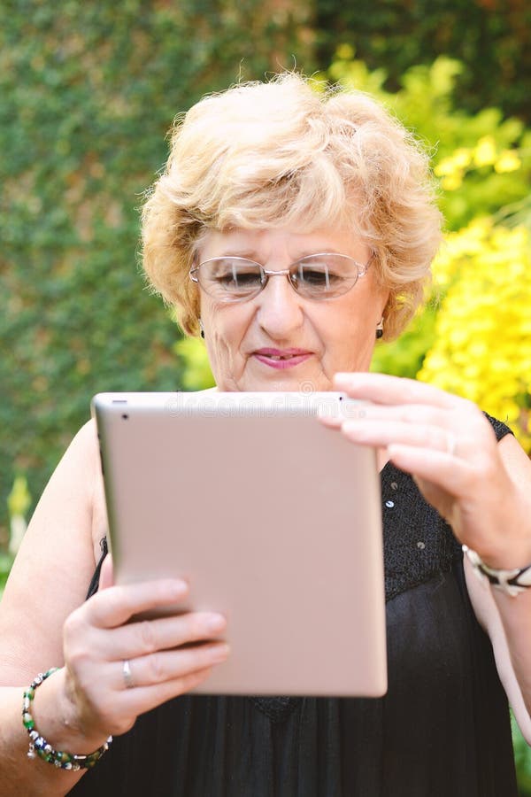 Elderly Woman Using Tablet. Stock Image - Image of beauty, internet ...