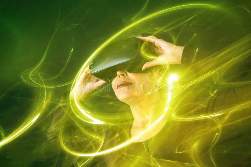 An Elderly Woman in Virtual Reality Glasses. with Visual Effects. an ...