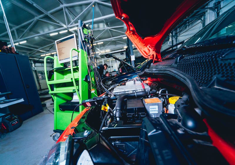 Electic Car with Open Hood. Details of Electric Car Engine Stock Image ...