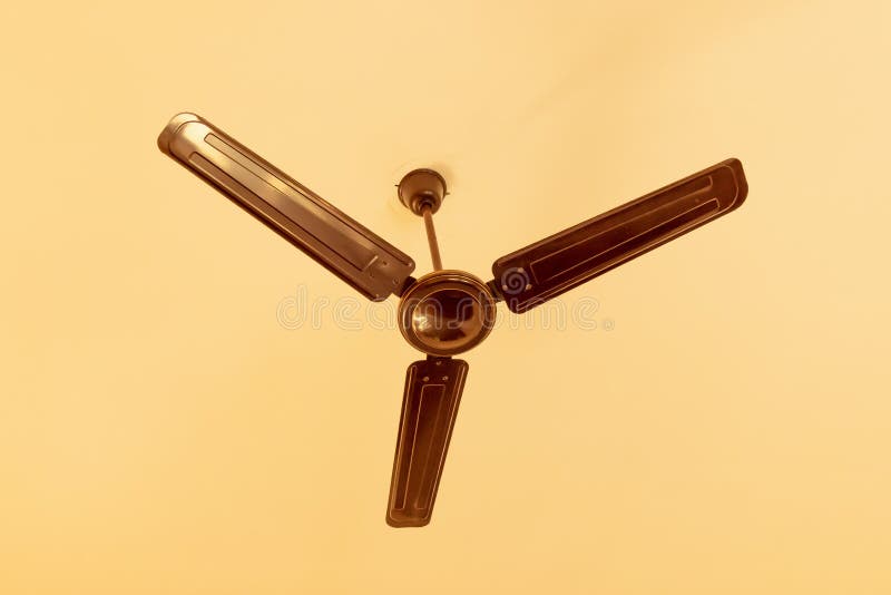 Electric Ceiling Fan Hanging in Ceiling of Room Stock Photo - Image of ...