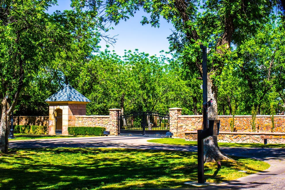 Electric Access/Exit Gates with Gate House & Entry Keypad Stock Image ...