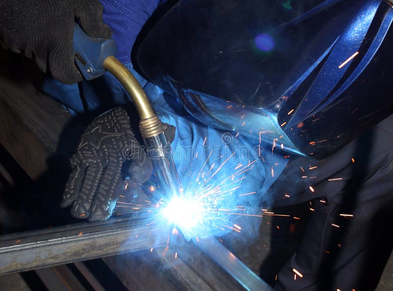 Electric Arc Welding. the Worker Welding Two Iron Corners Stock Image ...