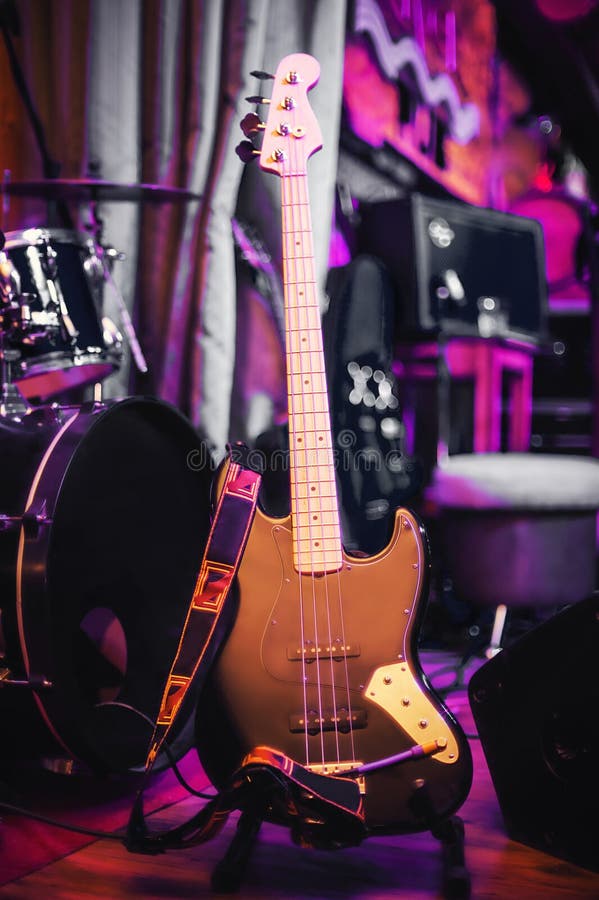 Electric Bass Guitar at Concert Stock Image - Image of guitar, heavy ...