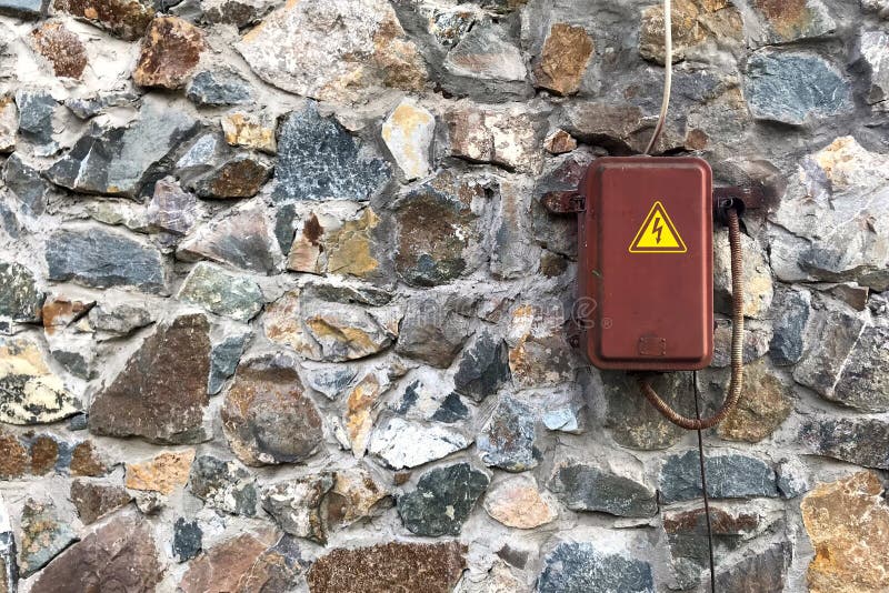 Old Stone Wall With Electric Switch Box Stock Photo - Image of pipe ...