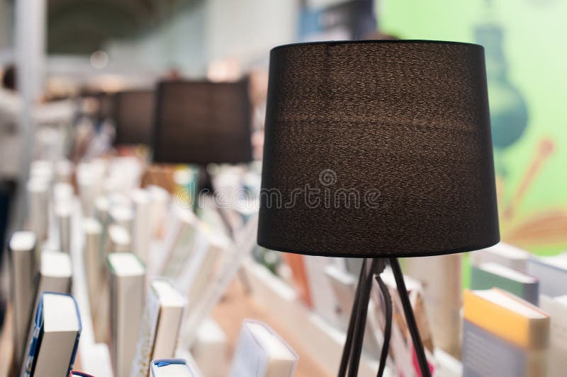 Electric Brown Table Reading Lamp and Books in a Library Stock Photo ...