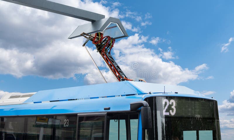 Electric bus at a stop stock photo. Image of blue, pantograph - 202156028
