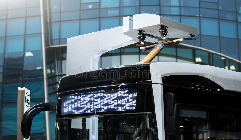 Electric bus at a stop stock photo. Image of induction - 202727454