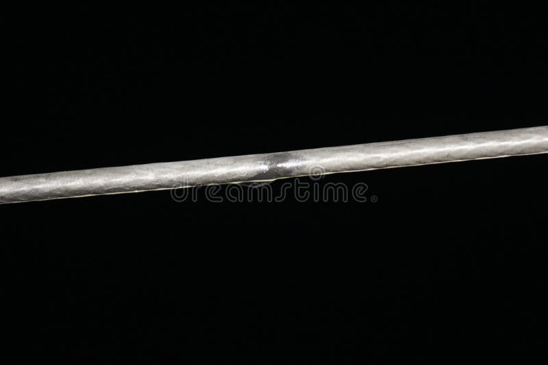 An Electric Cable in the Dark Night. a Drop of Rain Water is Falling ...