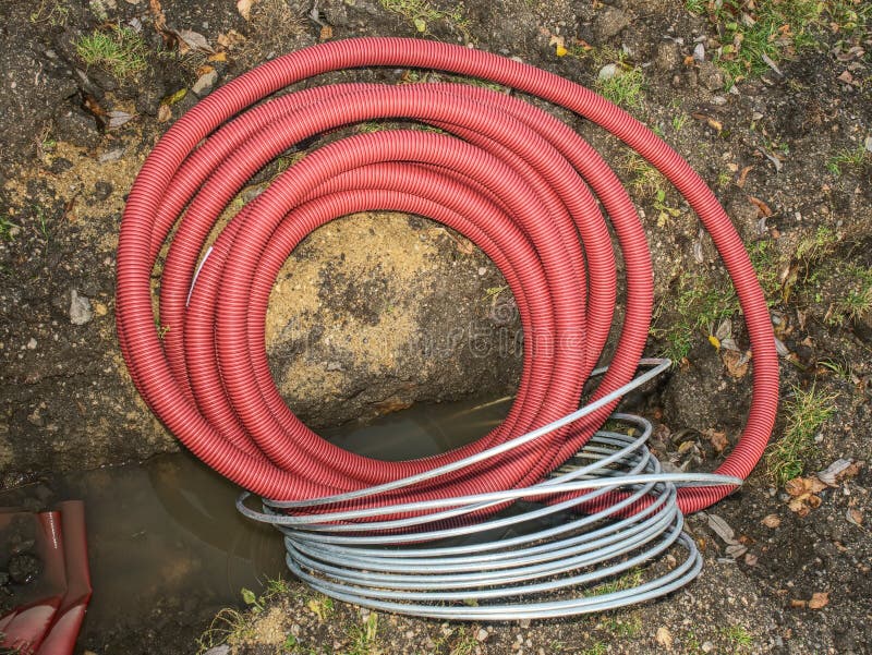 Electric Cable in the Flexible Safety Pipe in Pit Stock Image - Image ...