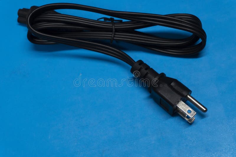 Electric Cable Plug. Three Pin Plug on the Table. Stock Photo - Image ...