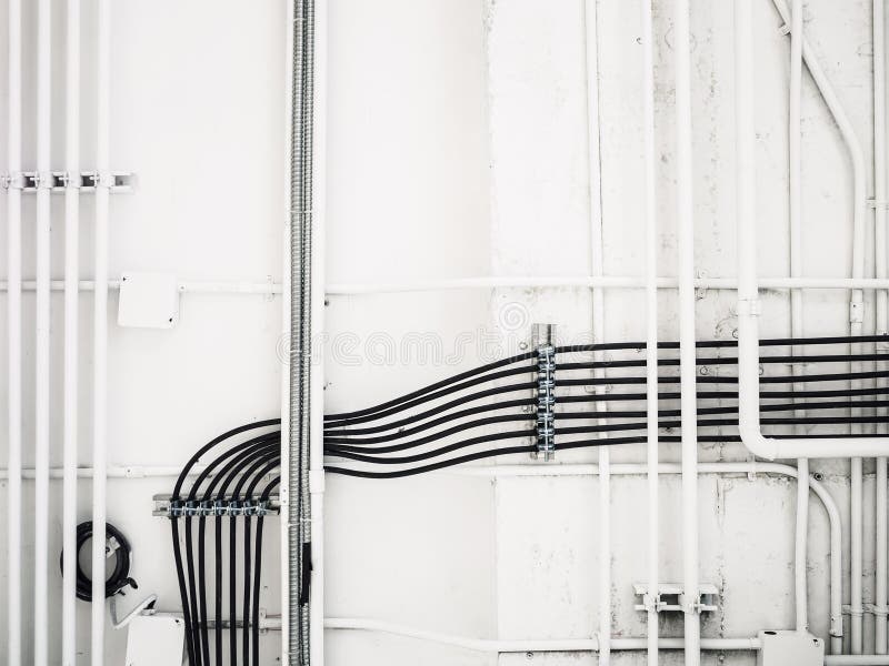 Electric Cable System on White Wall Stock Image - Image of power ...