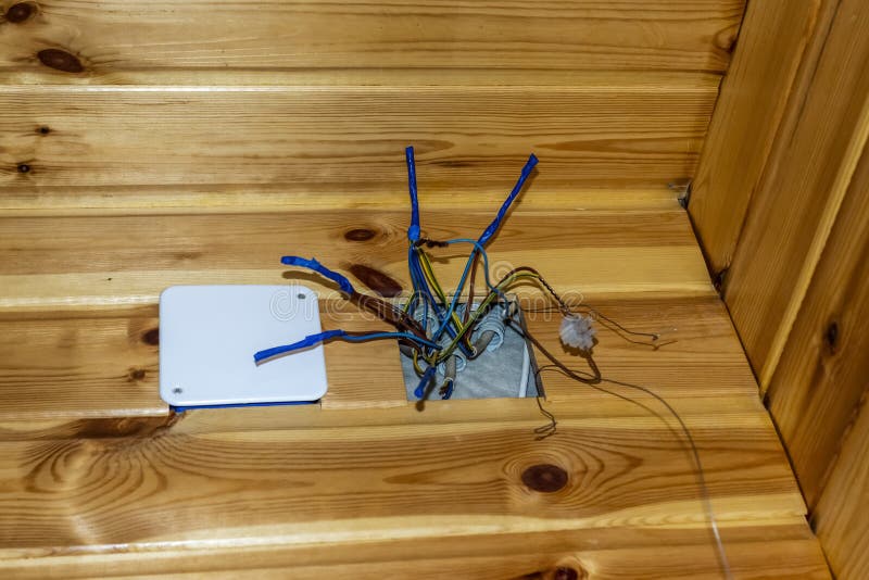 Electric Cables Stick Out from Electrical Panel on House Wooden Wall ...