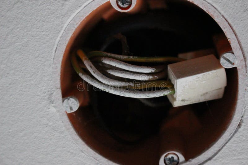 Electric Cables in a Wall Hole Held by Metal Screws Stock Photo - Image ...