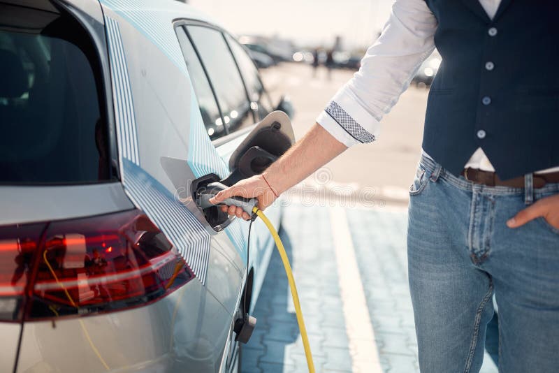 Electric Car Charging.Loading Energy of an Car Stock Photo - Image of ...