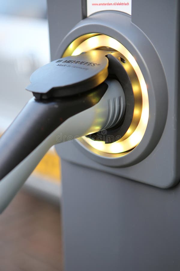Electric Car Charging Point with Out of Focus License Plate I Stock ...