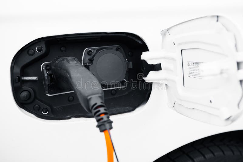 An Electric Car Charging with Power Plug Stock Image - Image of plug ...