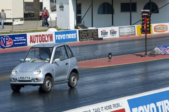Electric car drag racing editorial photography. Image of gwiz - 13996182