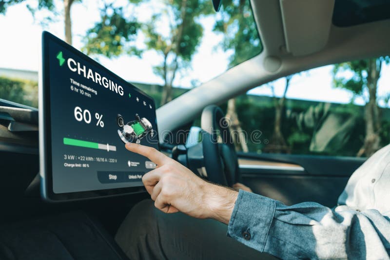 Electric Car Driver Checks Battery Charging Status App Screen in Car ...