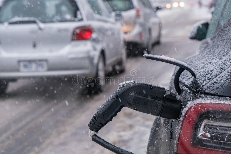 Electric Car Getting Charged in Montreal Stock Photo - Image of ...