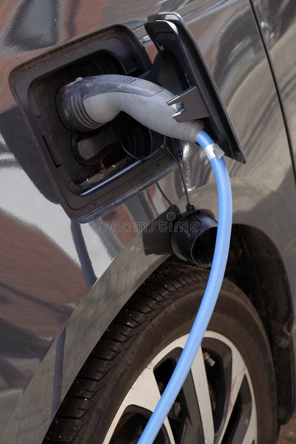 Electric car loading stock image. Image of electricity - 55311121