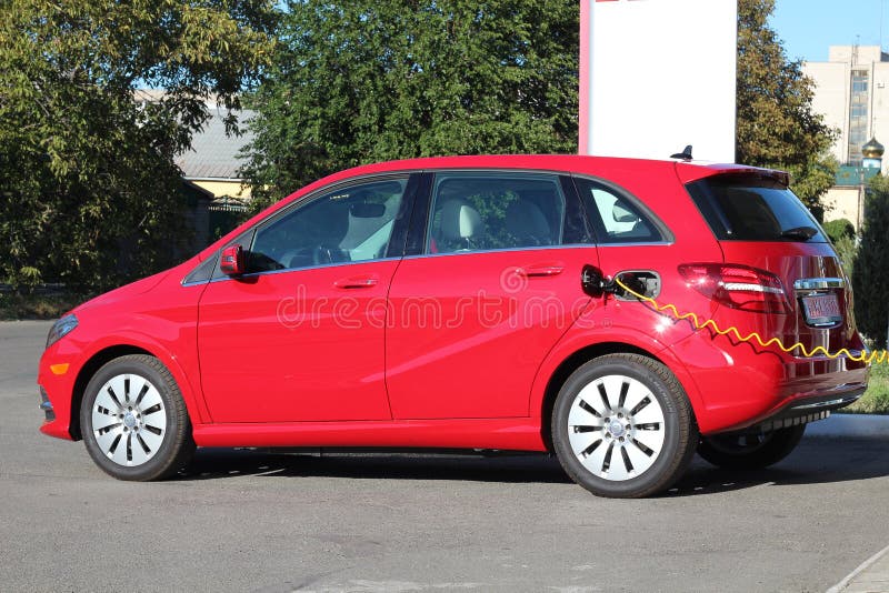 Electric car. Red color. editorial stock image. Image of mobil - 76381499