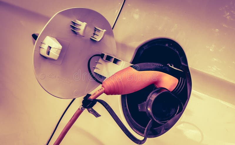 Electric car plug in editorial photo. Image of fuel - 146281876