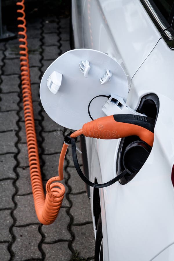Electric car plug in editorial image. Image of connection - 146282015