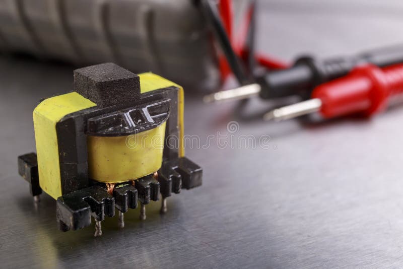 Electric Coil and Electric Meter. Measurement Work in an Electrical ...