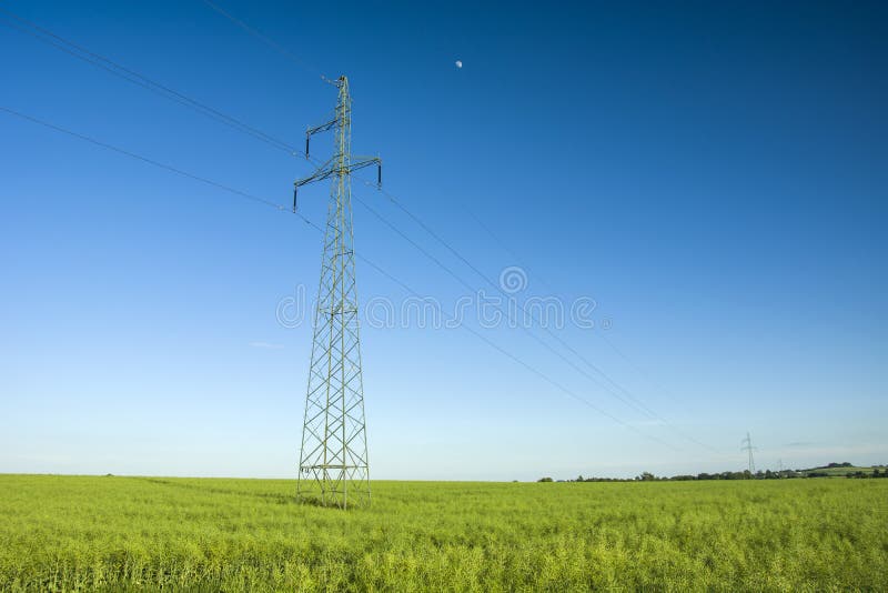 Electric Column on Green Field Stock Photo - Image of industry, line ...