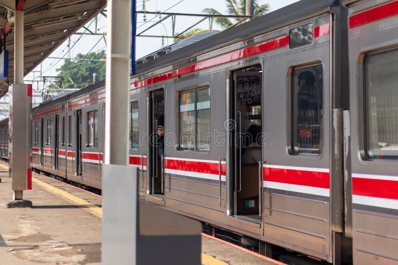 Electric Commuter Train Carriage with Open Doors at a Station Stock ...
