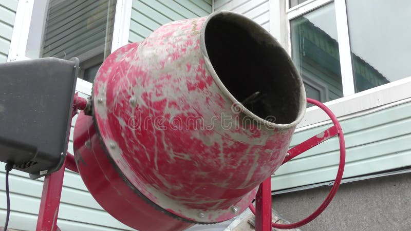 Electric Concrete Mixer Machine Working on a Construction Site. Stock ...