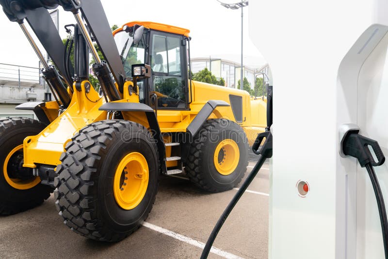 Electric Construction Machines with Charging Station. Concept Stock ...