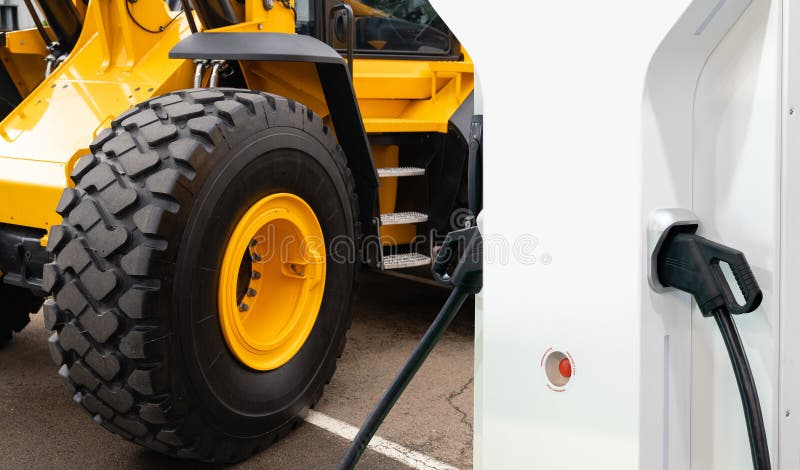 Electric Construction Machines with Charging Station. Concept. Stock ...