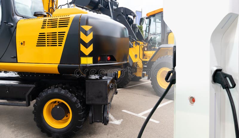 Electric Construction Machines with Charging Station. Concept. Stock ...