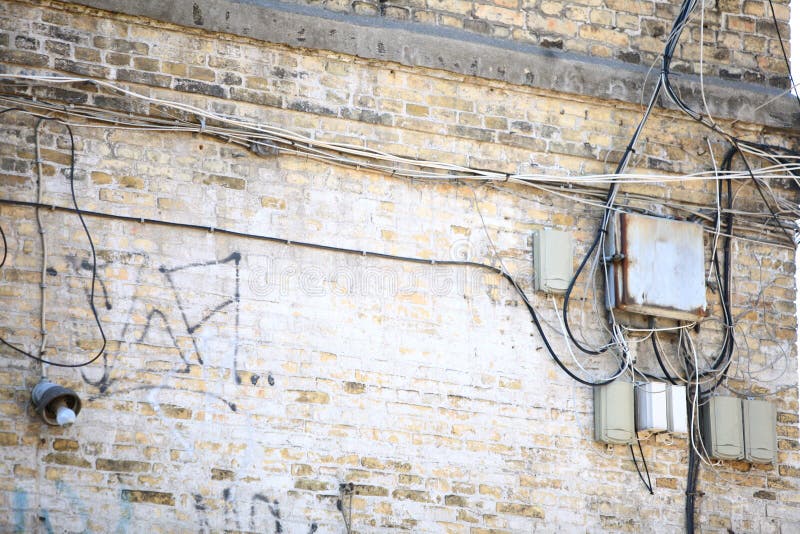 Electric Controller Box and Tangle of Cables on Brick Wall Stock Photo ...