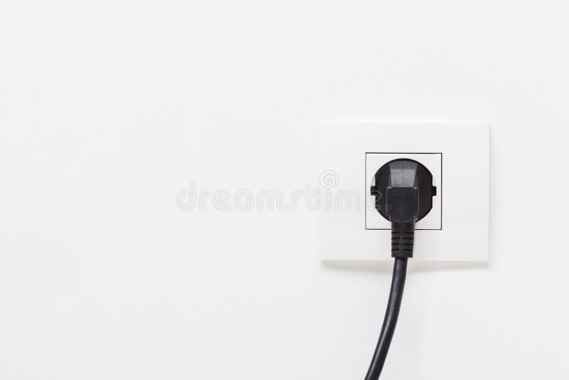 Plugged In Socket Against Green Tiles Background Stock Image - Image of ...