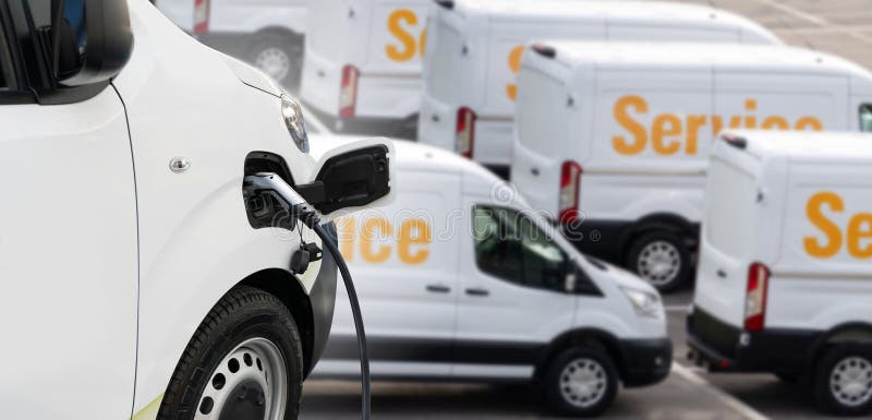 Electric Delivery Van with Connected Charging Cable Stock Photo - Image ...