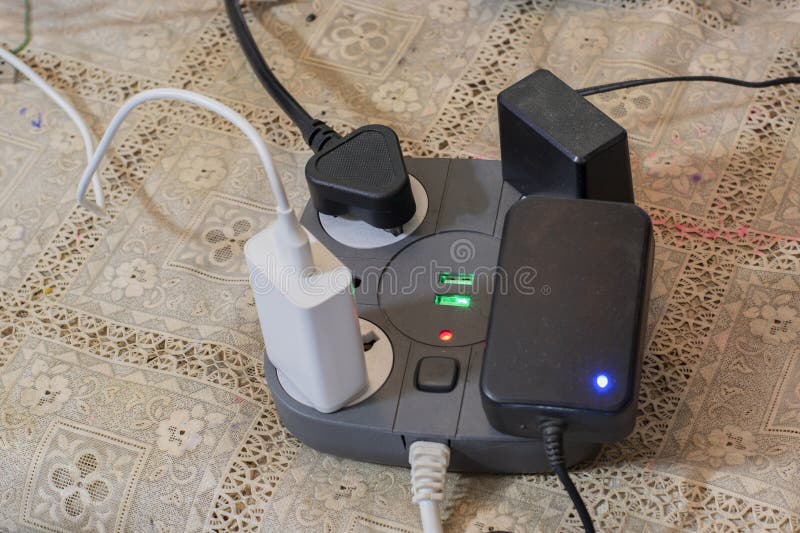 Electric Device Adapters Connected To Multi Pin Plug Socket Stock Image ...