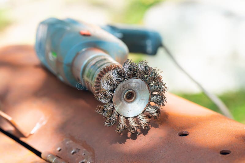 Electric Drill with Wire Attachment for Removing Rust and Corrosion ...