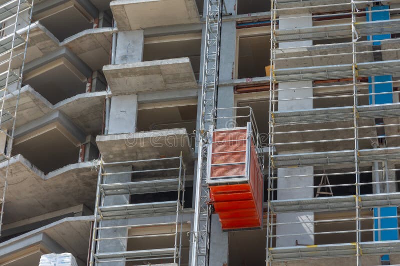 Electric Elevator for Construction Site Installed Outside the Facade of ...