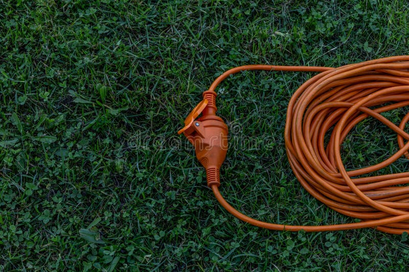 Electric Extension Cord and Power Connection in the Garden Stock Image ...