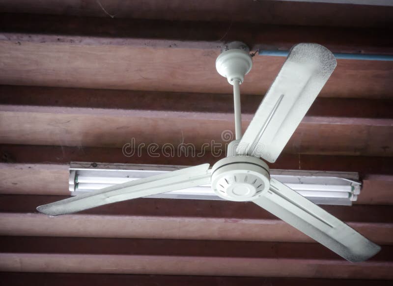 Electric Fan is Rotating on the Wooden Ceiling. Stock Photo - Image of ...