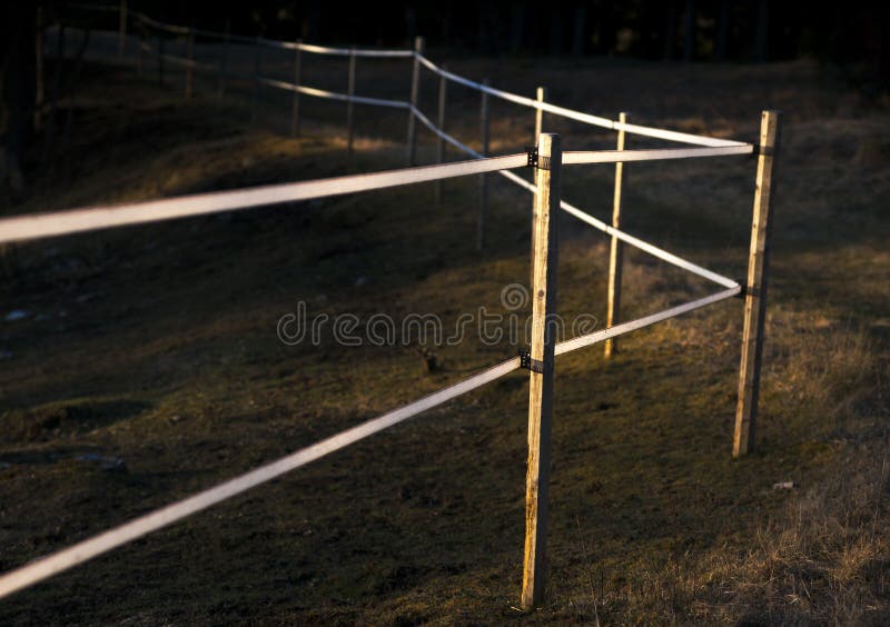 Electric Fence in Evening Light Stock Image - Image of electric, dusk ...
